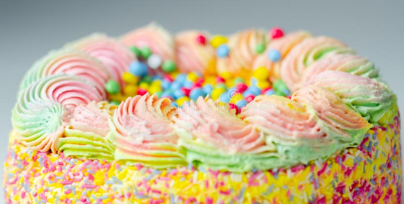 Madeira Sponge Coated with Yellow Colour Frosting, Layered with Plum ...