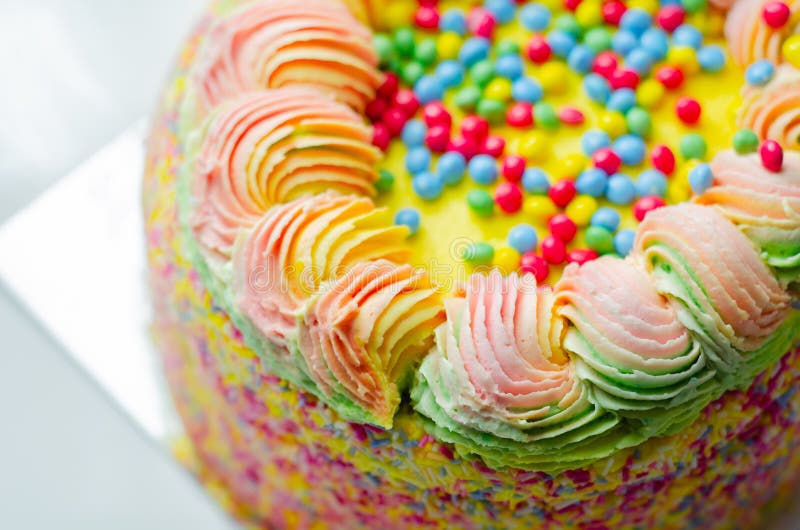 Madeira Sponge Coated with Yellow Colour Frosting, Layered with Plum ...