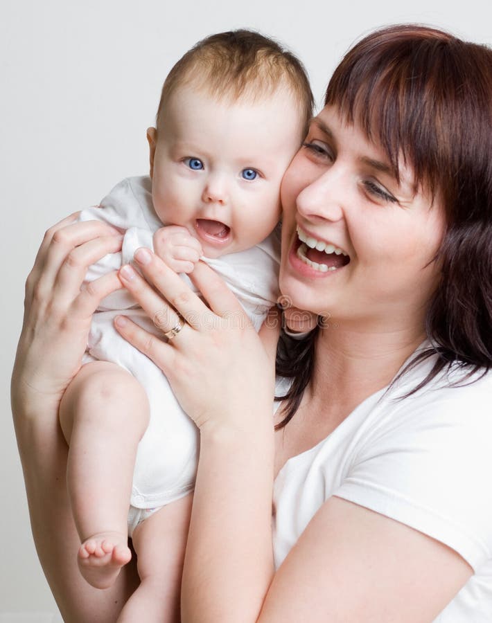 Madre y bebé imagen de archivo. Imagen de bebé, padre - 4270149