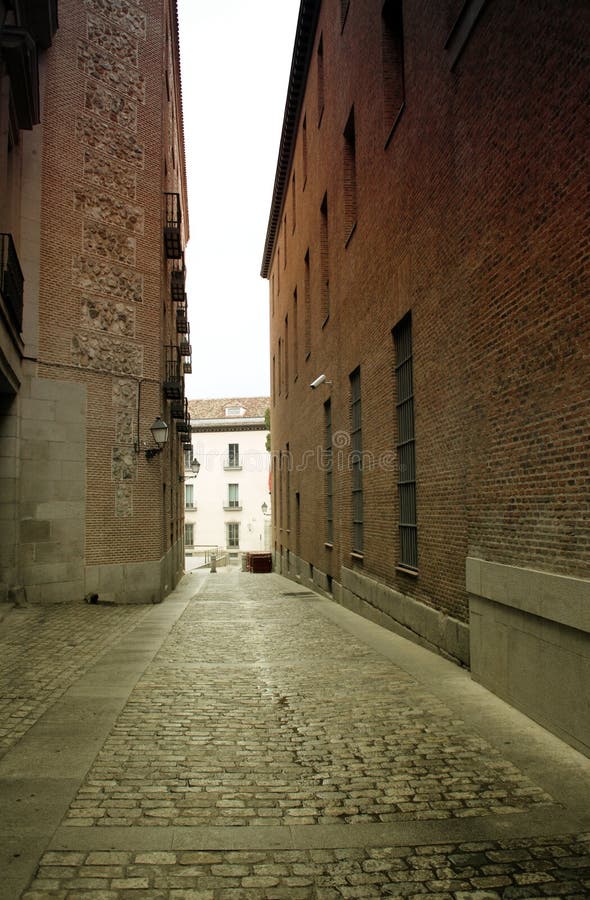 Narrow alley in Tuscany stock image. Image of distressed - 30672837