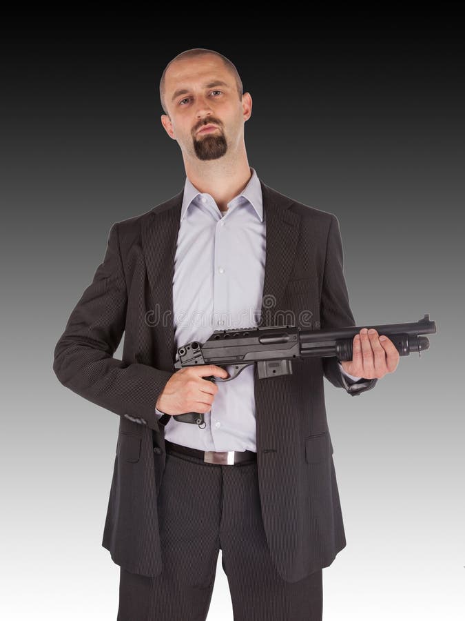 Mafia Man Is Holding A Shotgun Royalty Free Stock Image - Image: 32966686