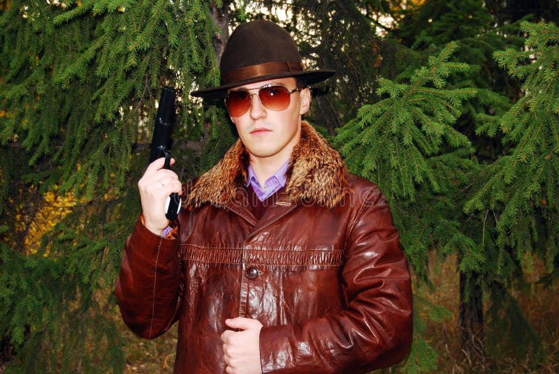 Mafia type with revolver. stock image. Image of safety - 13190597