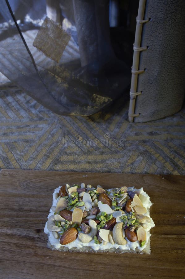 Mafrooka, Arabic Sweets of Cream and Nuts for Ramadan and Eid Stock ...