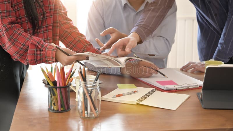 Editor Talking A Plan For Magazine Edit Team. Stock Photo - Image of ...