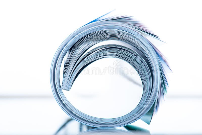 Magazine roll on white stock photo. Image of advertise - 155816108