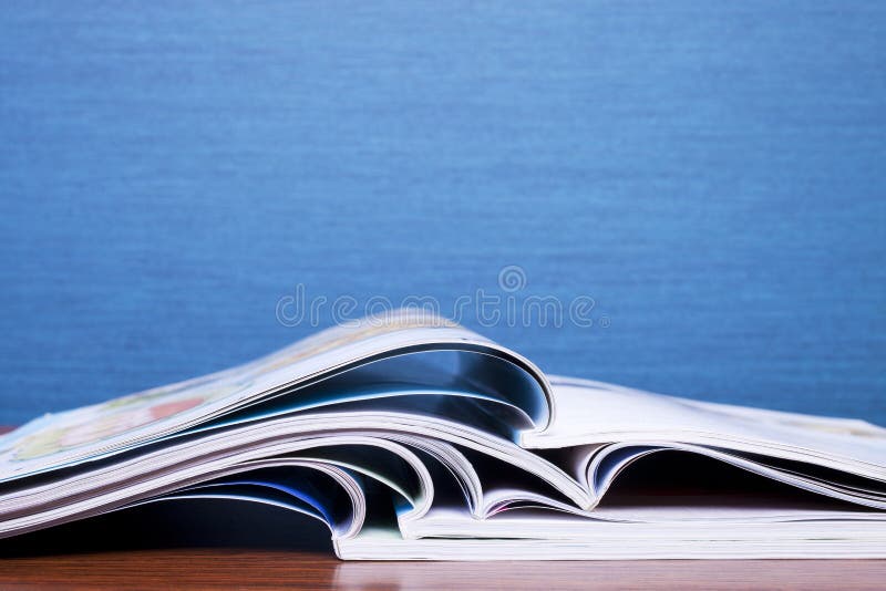 Magazines on Blue Background Stock Image - Image of blue, copy: 25485773