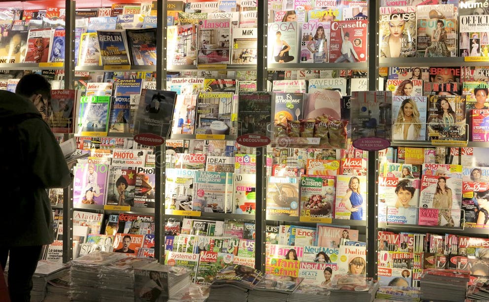 Magazines in press stand editorial photo. Image of newspapers - 29859556
