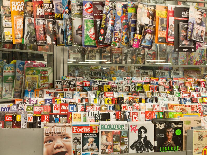 Magazines in press stand editorial stock photo. Image of papers - 36053693