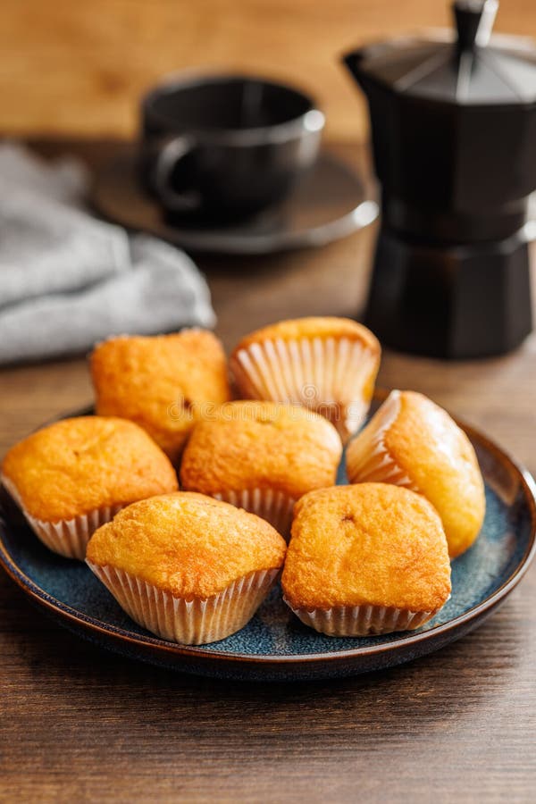 Magdalenas the Typical Spanish Plain Muffins on Plate on Wooden Table ...