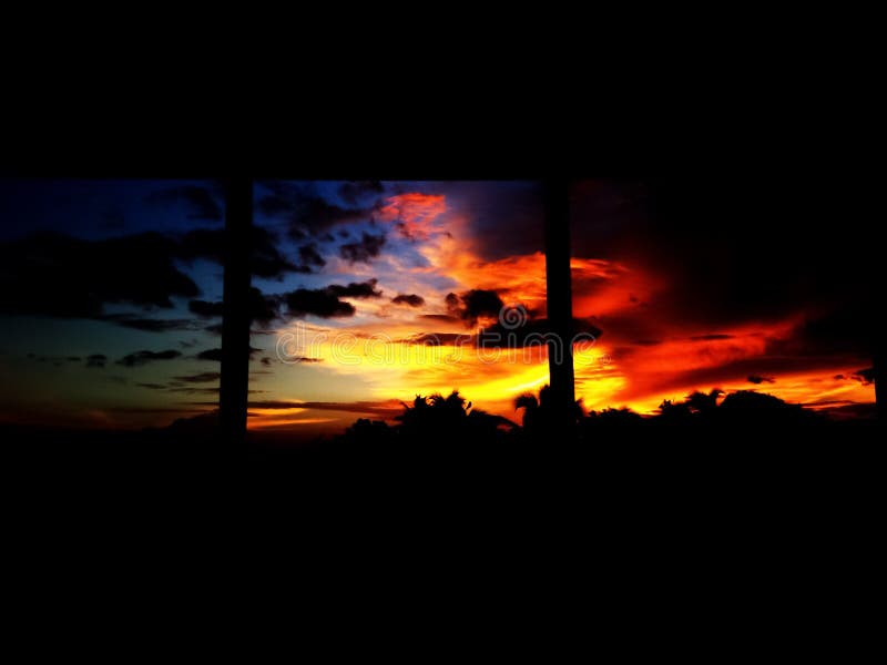 Bloody sunset over a lake stock photo. Image of colorful - 198587162