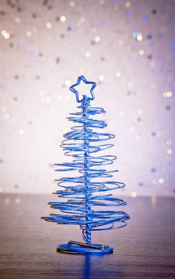 A Magic Blue Metallic Modern Christmas Tree on Wood Table Stock Image ...