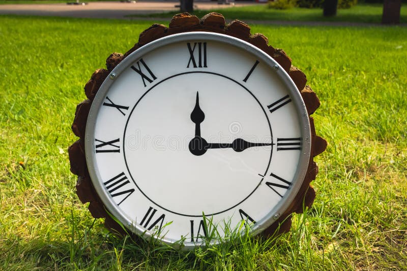 Magic Clock on the Green Lawn.Clock on the Green Grass Stock Photo ...