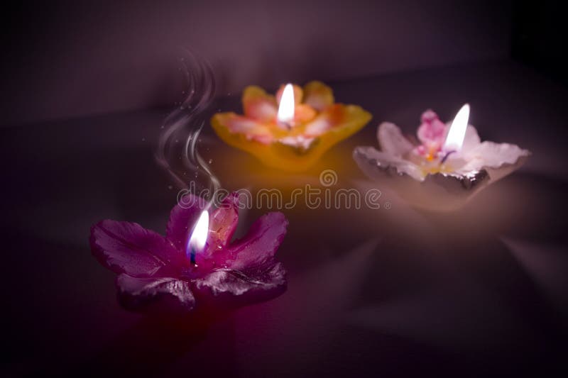 Magic flower shape candles stock photo. Image of glow - 28975932