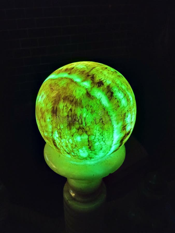 The Magic of Green Marble: Spheres of Light in the Darkness Stock Image ...
