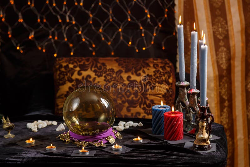 Magic Salon with Crystal Ball and Candles on the Table. Stock Image ...