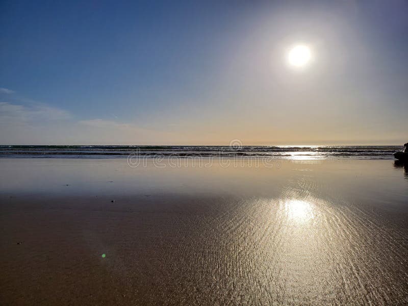 Magic Sunlight Effects on the Golden Sand with Water Stock Photo ...