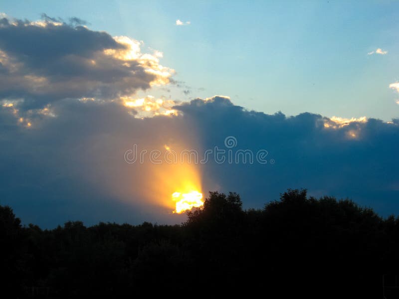Magic Sunset. Beautiful Dark Clouds at Sunset after a Thunderstorm ...