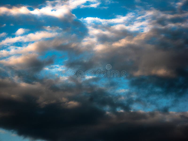 Magic Sunset. Beautiful Dark Clouds at Sunset after a Thunderstorm ...