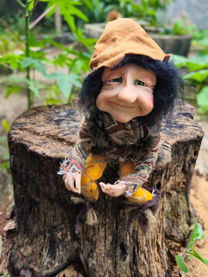 Magical Earth Elf Resting on the Trunk. Stock Photo - Image of ...