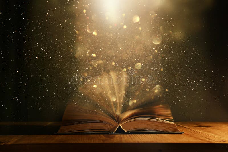 Magical Image of Open Antique Book Over Wooden Table with Glitter ...