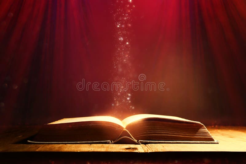 Magical Image of Open Antique Book Over Wooden Table with Glitter ...