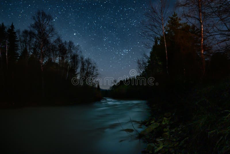 A Magical Starry Night on the Mountain River Bank. Stock Photo - Image ...