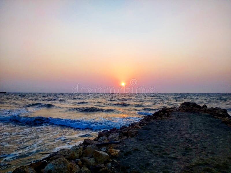 Magical sunset stock image. Image of sunset, water, beach - 114914935