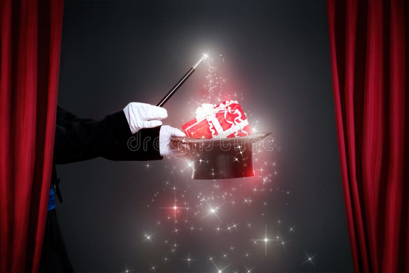 Magician Hand with Magic Wand Making Christmas Gift Stock Image - Image ...