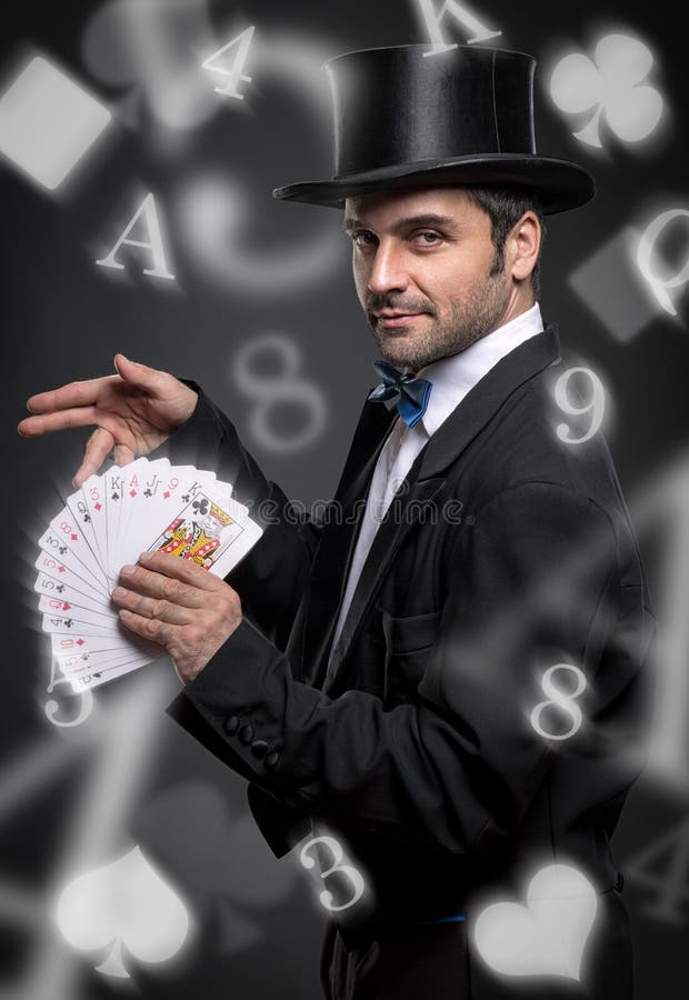 Magician Performing Trick with Playing Cards Stock Photo - Image of ...