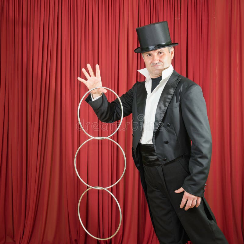 Magician Performing Trick with Rings Stock Image - Image of illusion ...