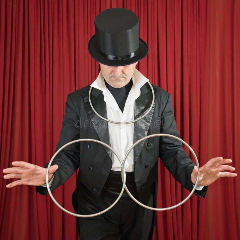 Magician with rings stock photo. Image of curtain, arts - 218261626