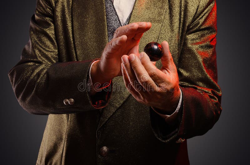 Magician Shows Trick with Magic Balls. Sleight of Hand. Manipulation ...