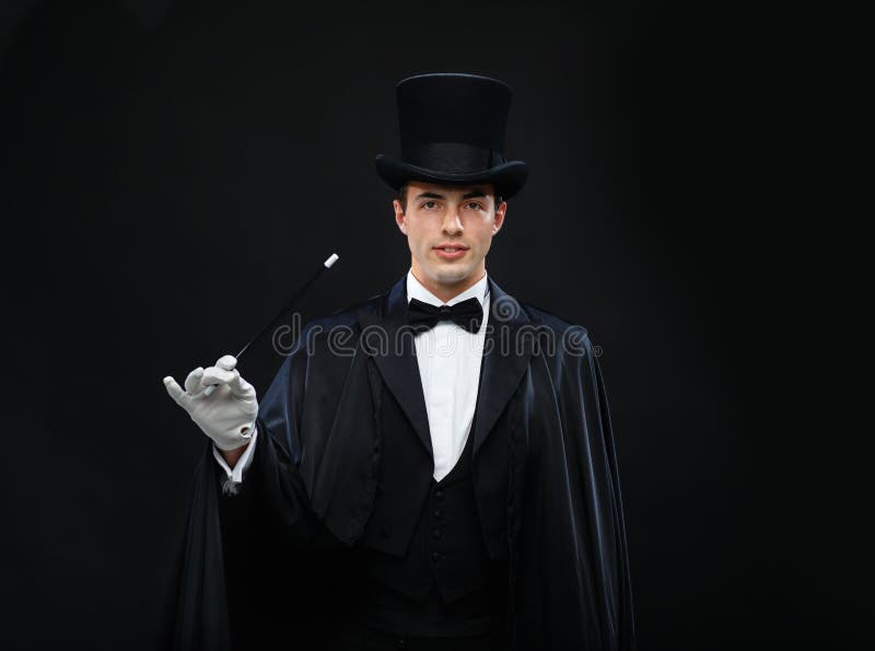 Magician in Top Hat with Magic Wand Showing Trick Stock Image - Image ...