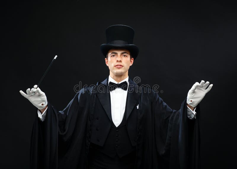 Magician in Top Hat with Magic Wand Showing Trick Stock Photo - Image ...