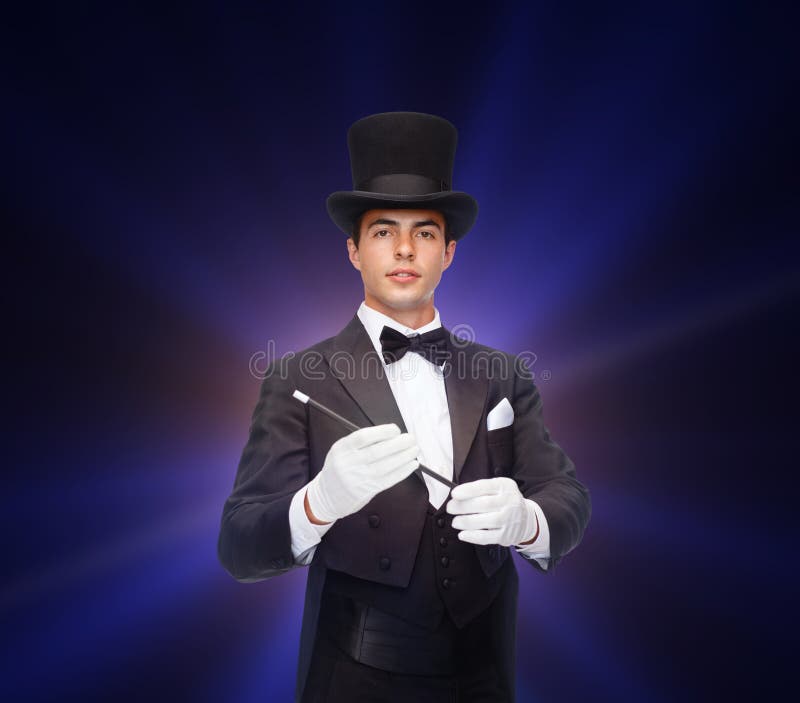 Magician in Top Hat with Magic Wand Showing Trick Stock Photo - Image ...