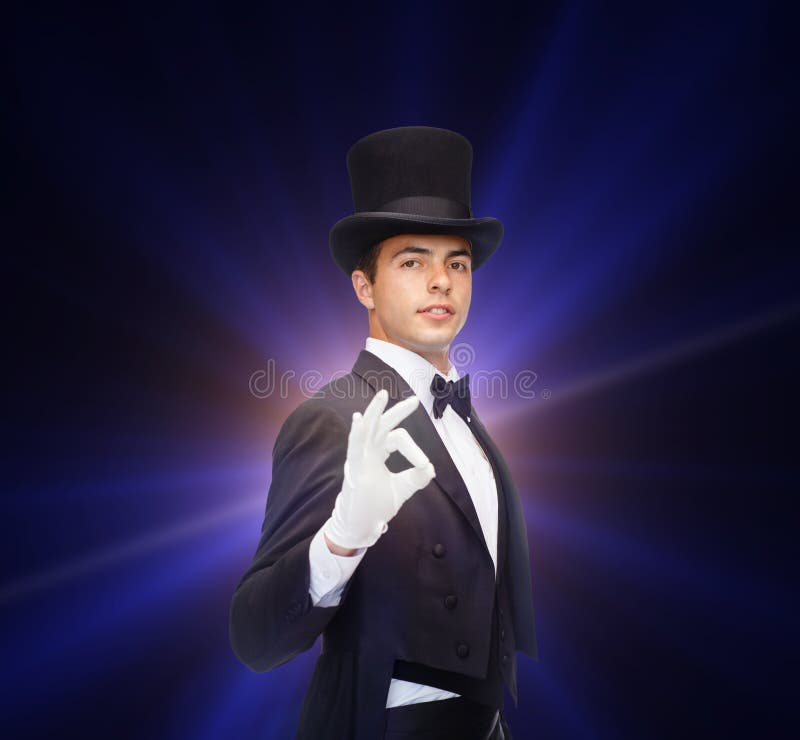 Magician in Top Hat Showing Trick Stock Photo - Image of circus ...