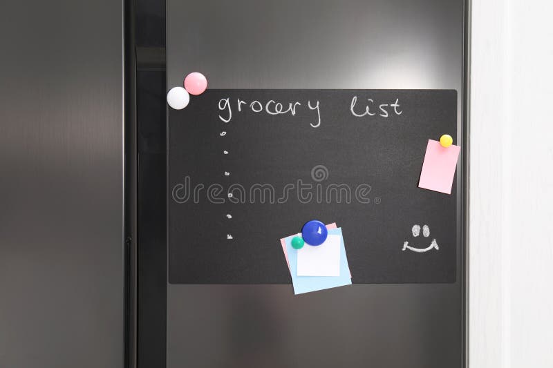 Magnetic Board with Grocery List and Notes on Refrigerator in Kitchen ...