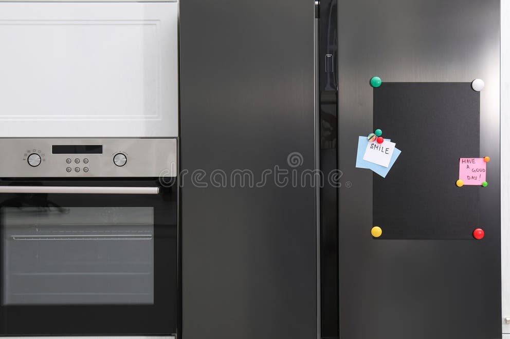 Magnetic Board and Notes on Refrigerator in Kitchen Stock Image - Image ...