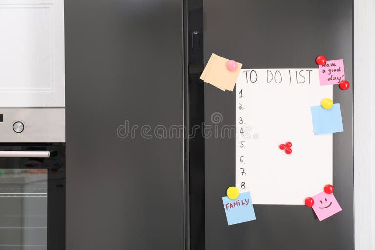Magnetic Board with To Do List and Notes on Refrigerator in Kitchen ...