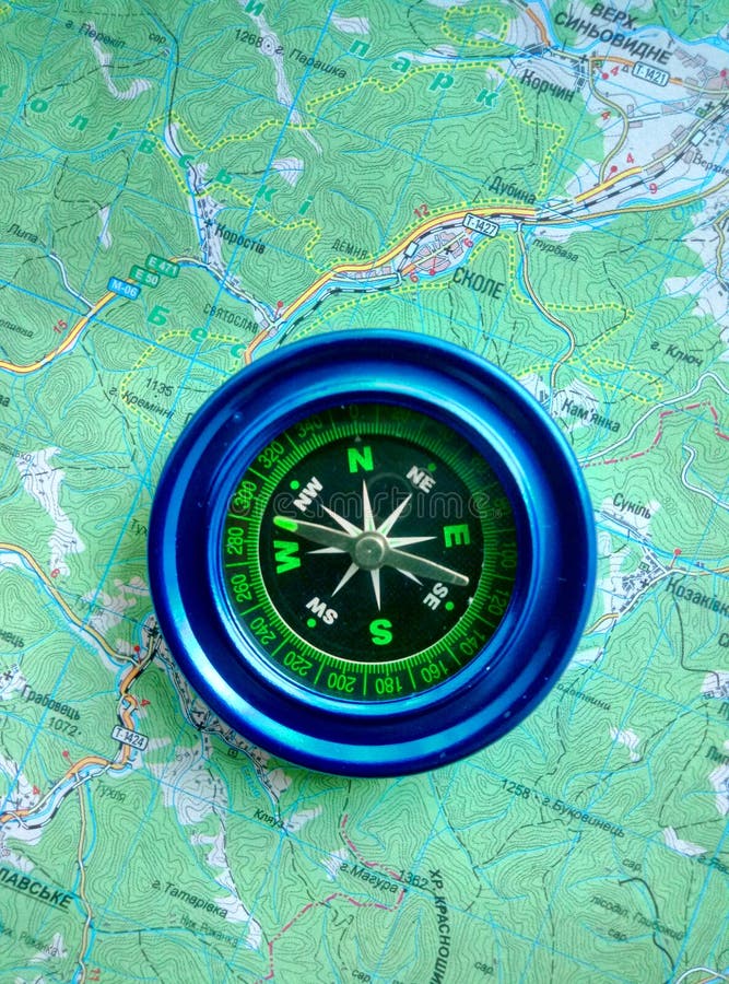 Magnetic Compass Blue on the Road Map. Stock Image - Image of earth ...