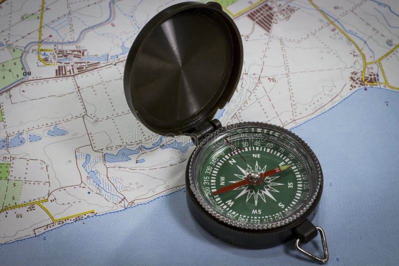 Magnetic Compass on the Map Stock Photo - Image of plan, instrument ...