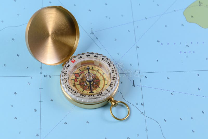Magnetic Compass on a Nautical Navigational Map Stock Image - Image of ...