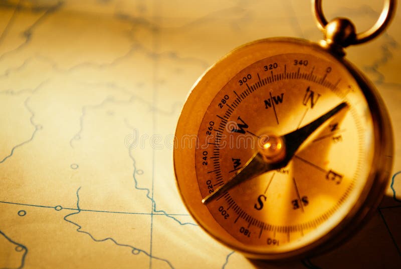 Magnetic Compass Standing Upright on a Map Stock Image - Image of east ...