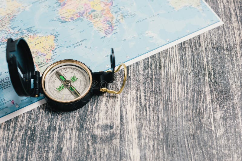 Magnetic Compass on a Wooden Table Stock Photo - Image of metal, east ...