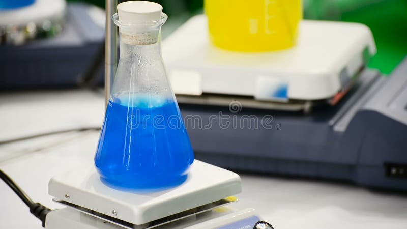 Magnetic Laboratory Stirrer Water with Magnet in Flask Stock Video ...