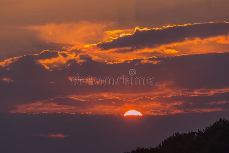A Magnificent Landscape of the Evening Sky with a Red Disc of the Sun ...