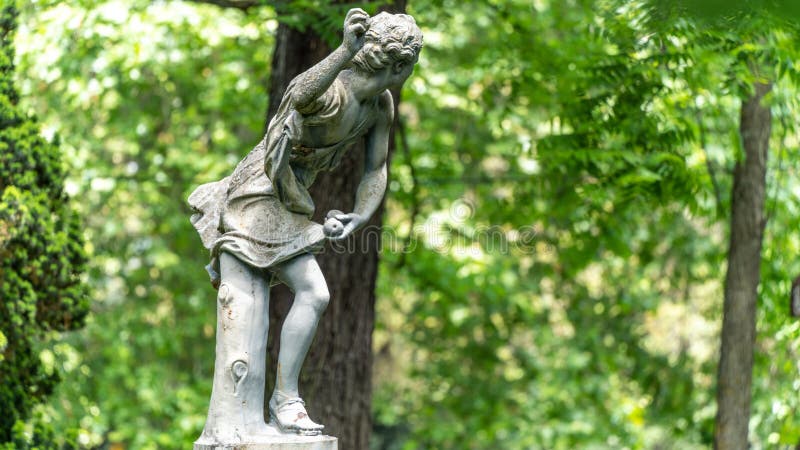 Magnificent Statue of a Leaning Character Throwing Something Editorial ...