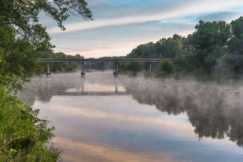 A Magnificent Sunrise on a River with Bridge Stock Image - Image of ...