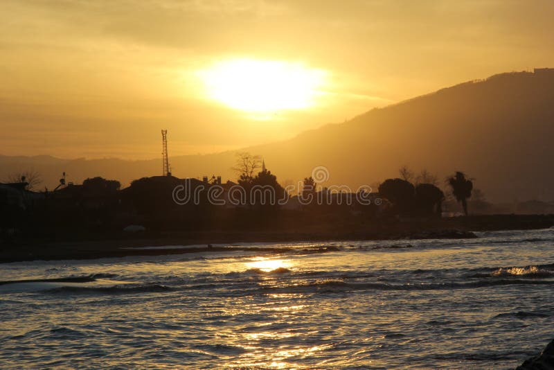 A Magnificent Sunset by the Sea. Red Sky Stock Image - Image of shadow ...