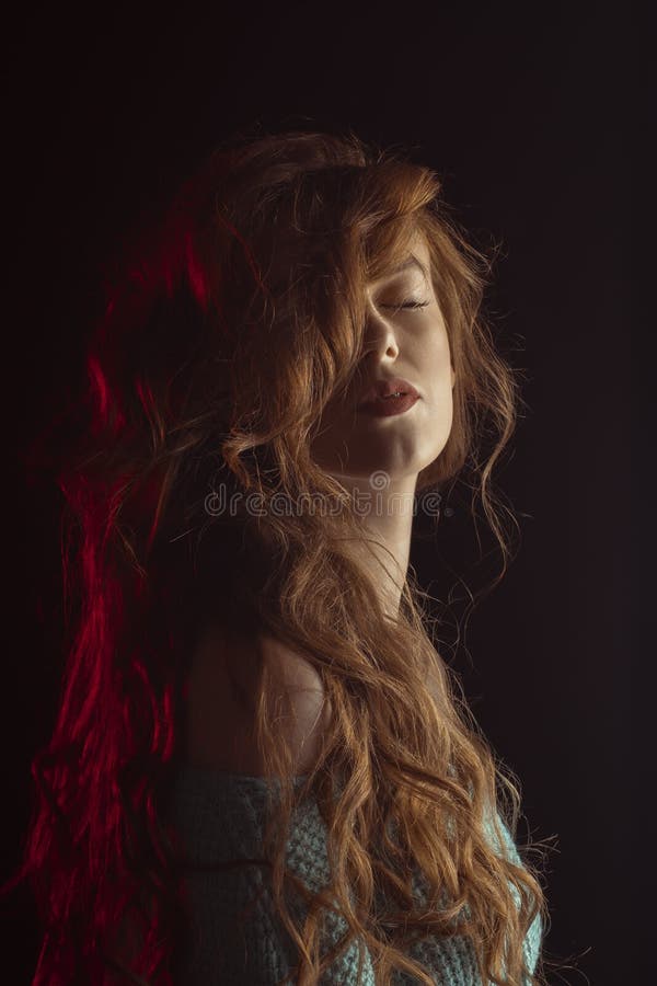 Magnificent Young Model in the Shadows with Red Light Stock Image ...
